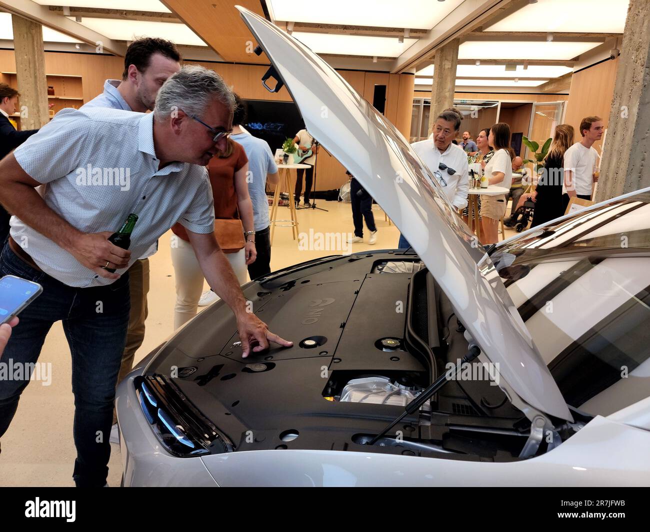 Rotterdam, Netherlands. 15th June, 2023. People look at an EL6 electric ...