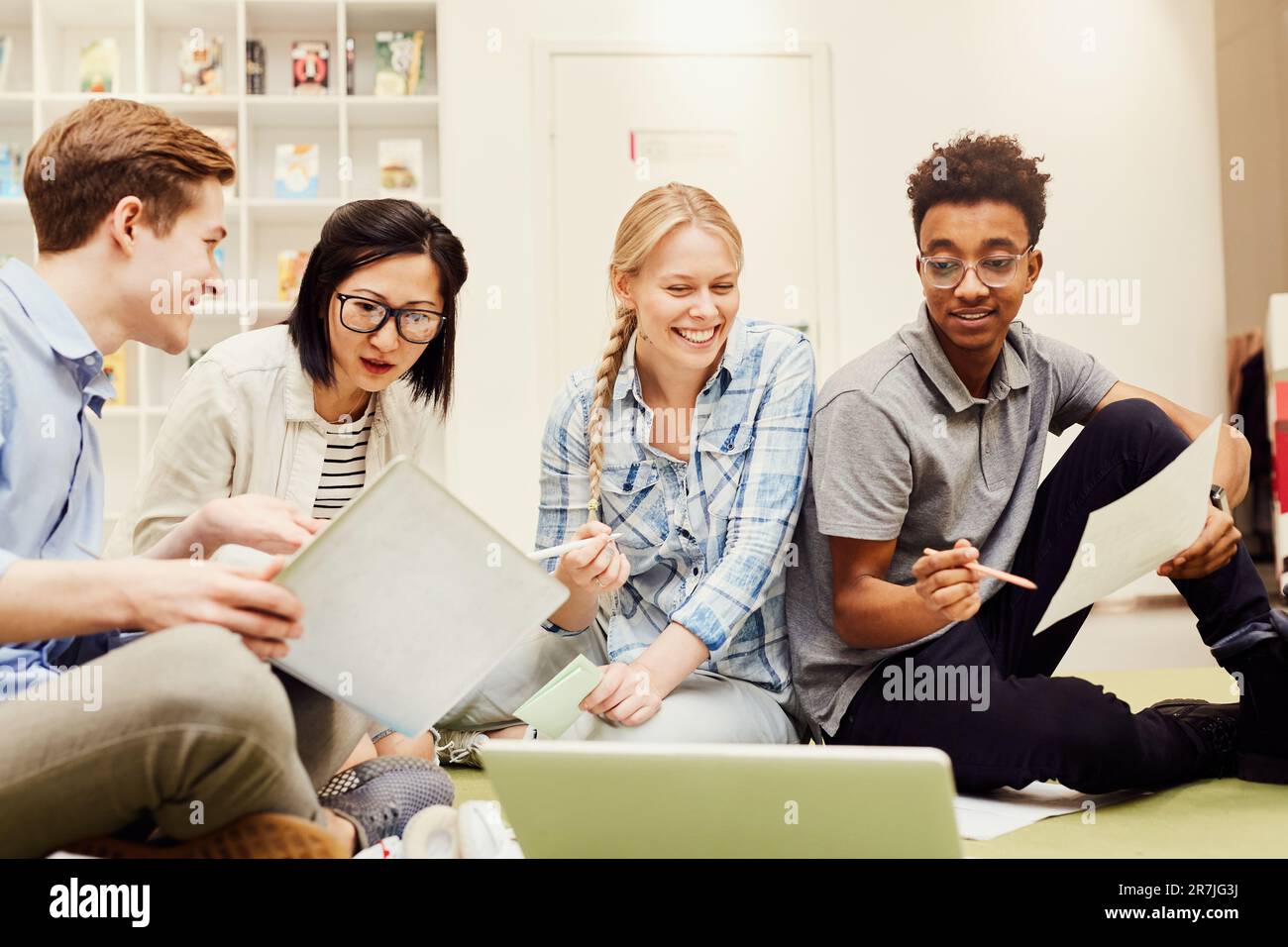 High school students talking paper hi-res stock photography and images ...