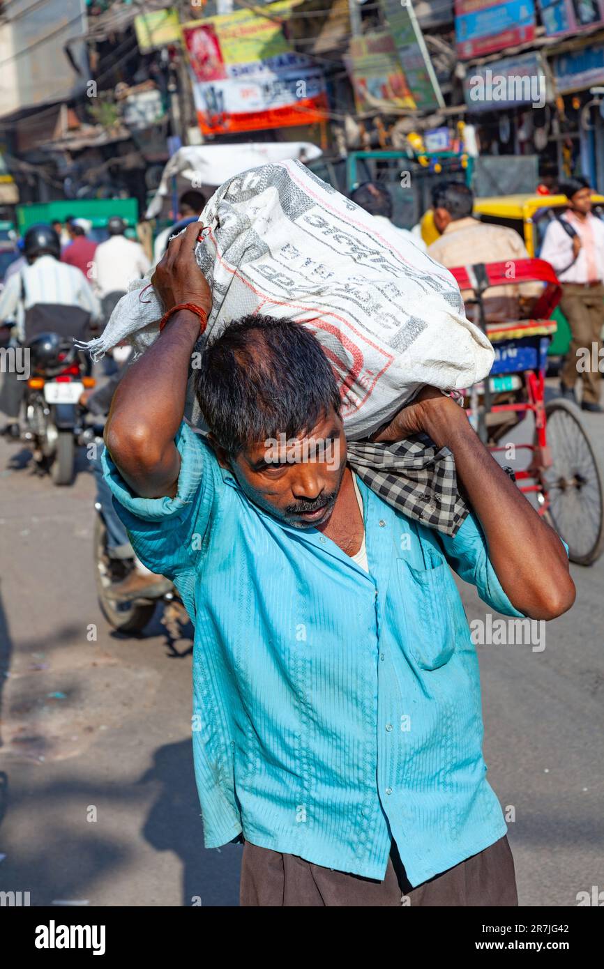 Indian man carrying sack hi-res stock photography and images - Alamy
