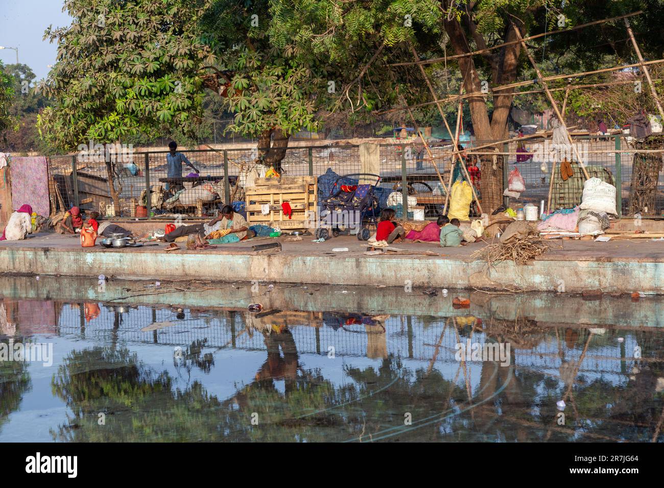 Delhi, India - November 17, 2011: poor homeless families live at the ...