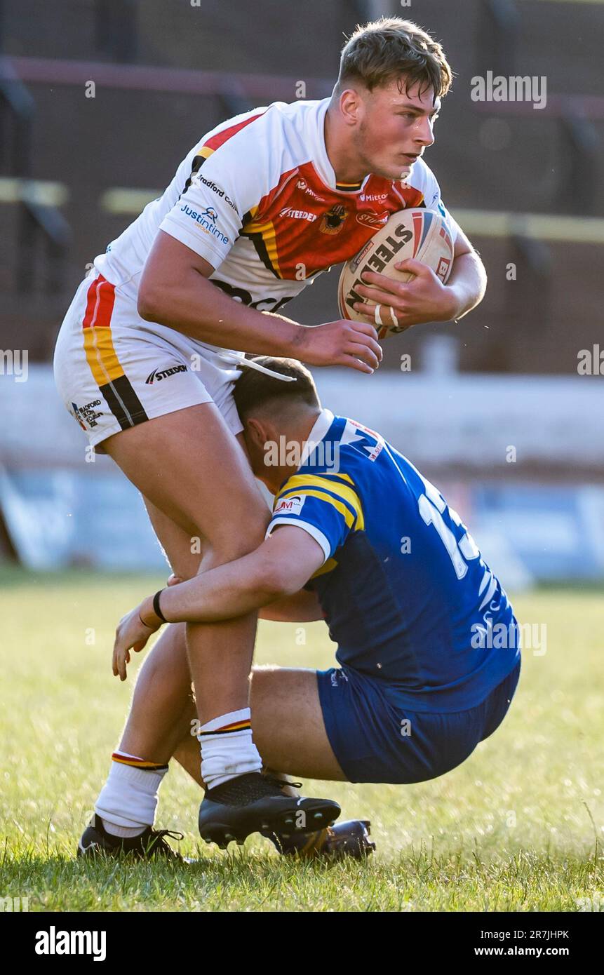 Bradford Bulls Academy's Jack Iceton is tackled by Leeds Rhinos Academy ...
