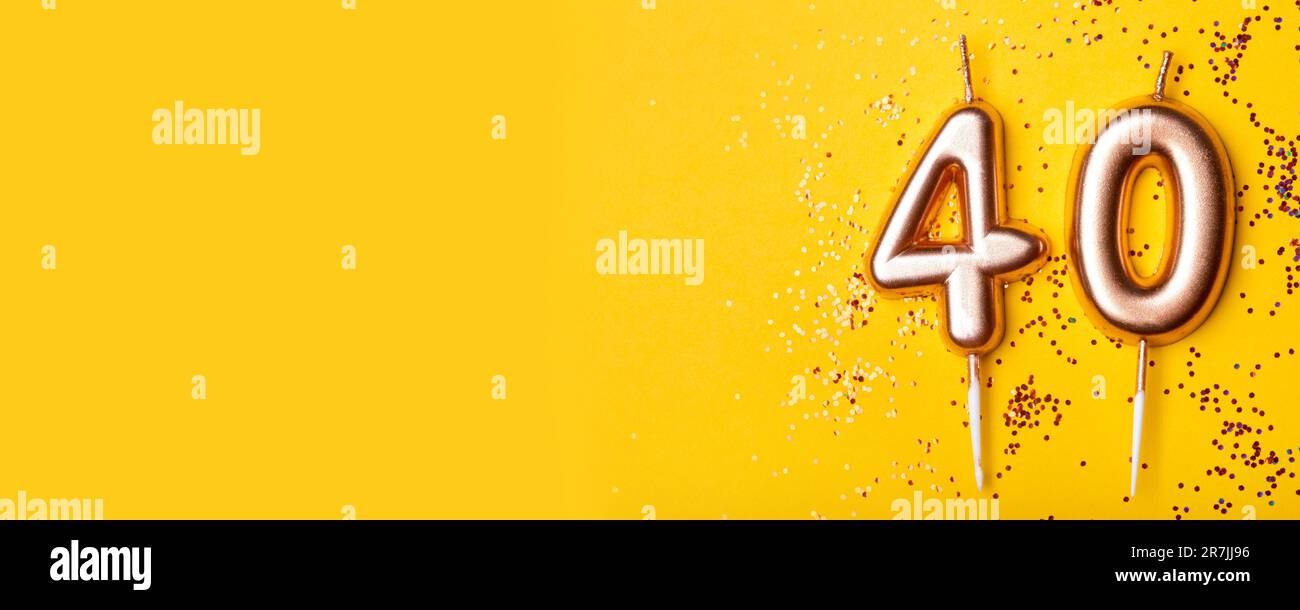 40 years celebration. Greeting banner. Gold candles in the form of ...