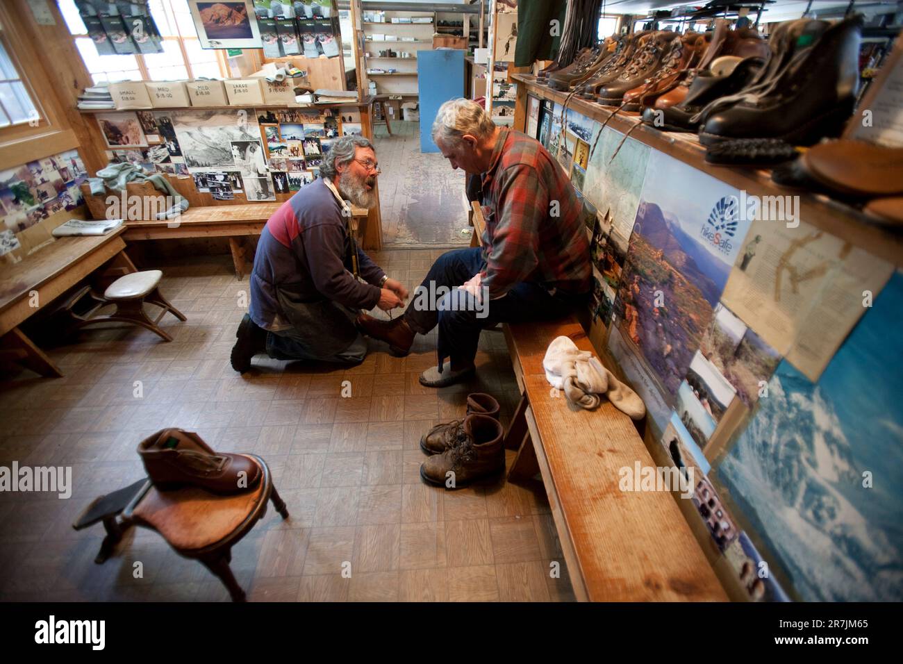 Peter Limmer fits a customer for new hiking boots at Limmer & Sons boot ...