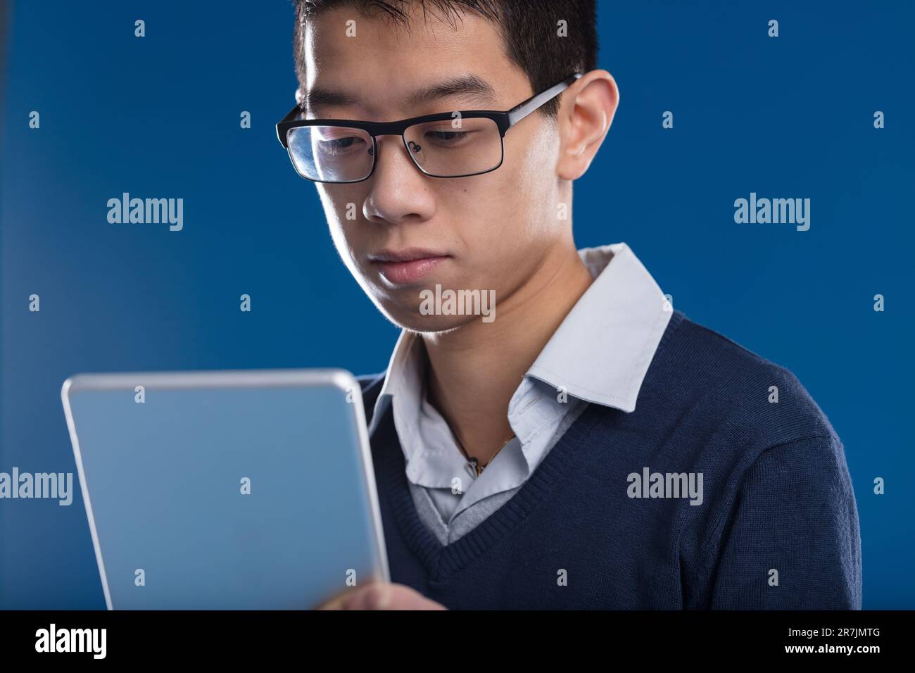 Scrutinizing news hi-res stock photography and images - Alamy
