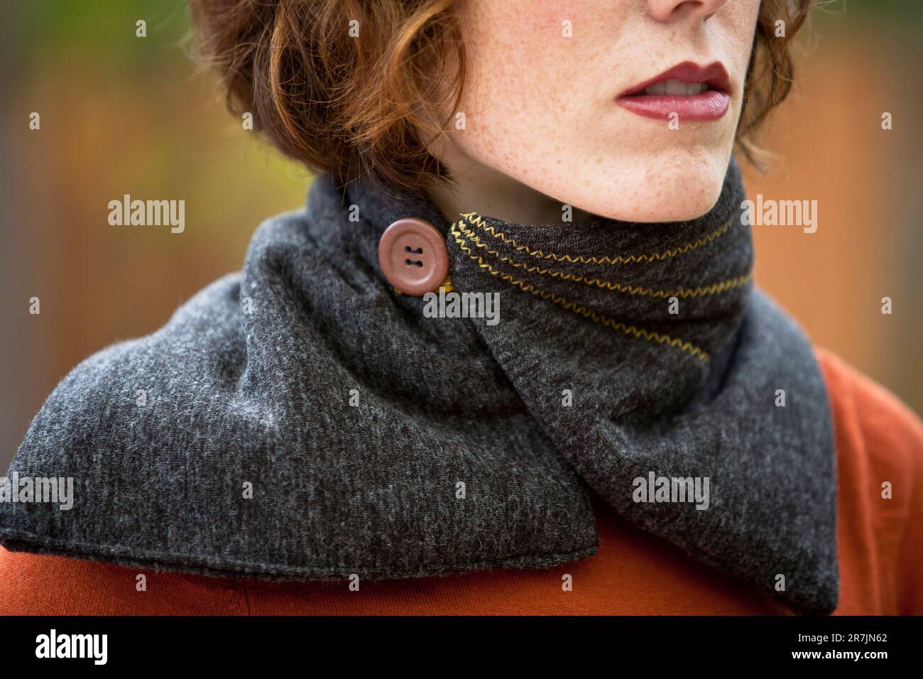 A woman wears a handmade gray wool cowl around her neck in Seattle ...