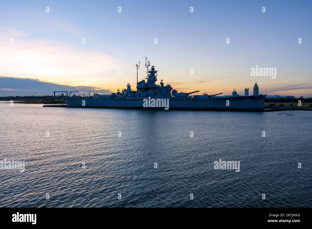 USS Alabama battleship at sunset Stock Photo - Alamy