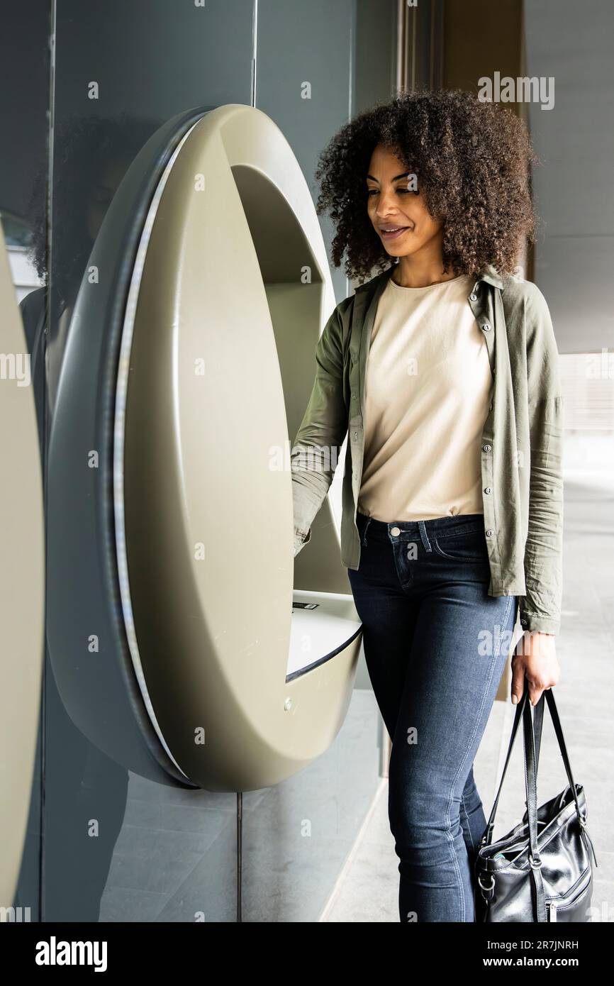 Standing atm machine hi-res stock photography and images - Alamy