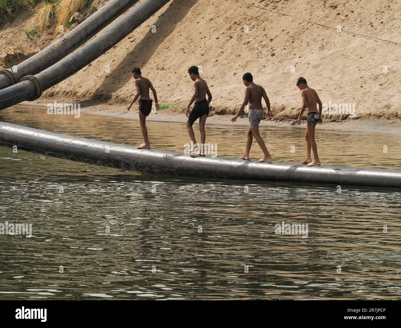 Balancing people hi-res stock photography and images - Alamy