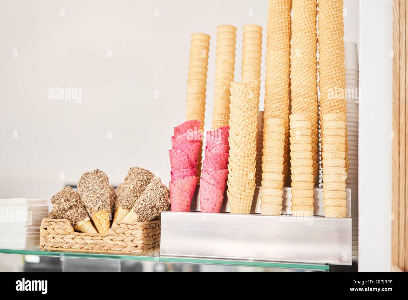 blank ice cream wafers. Waffle cones in an ice-cream shop, Italy. A ...