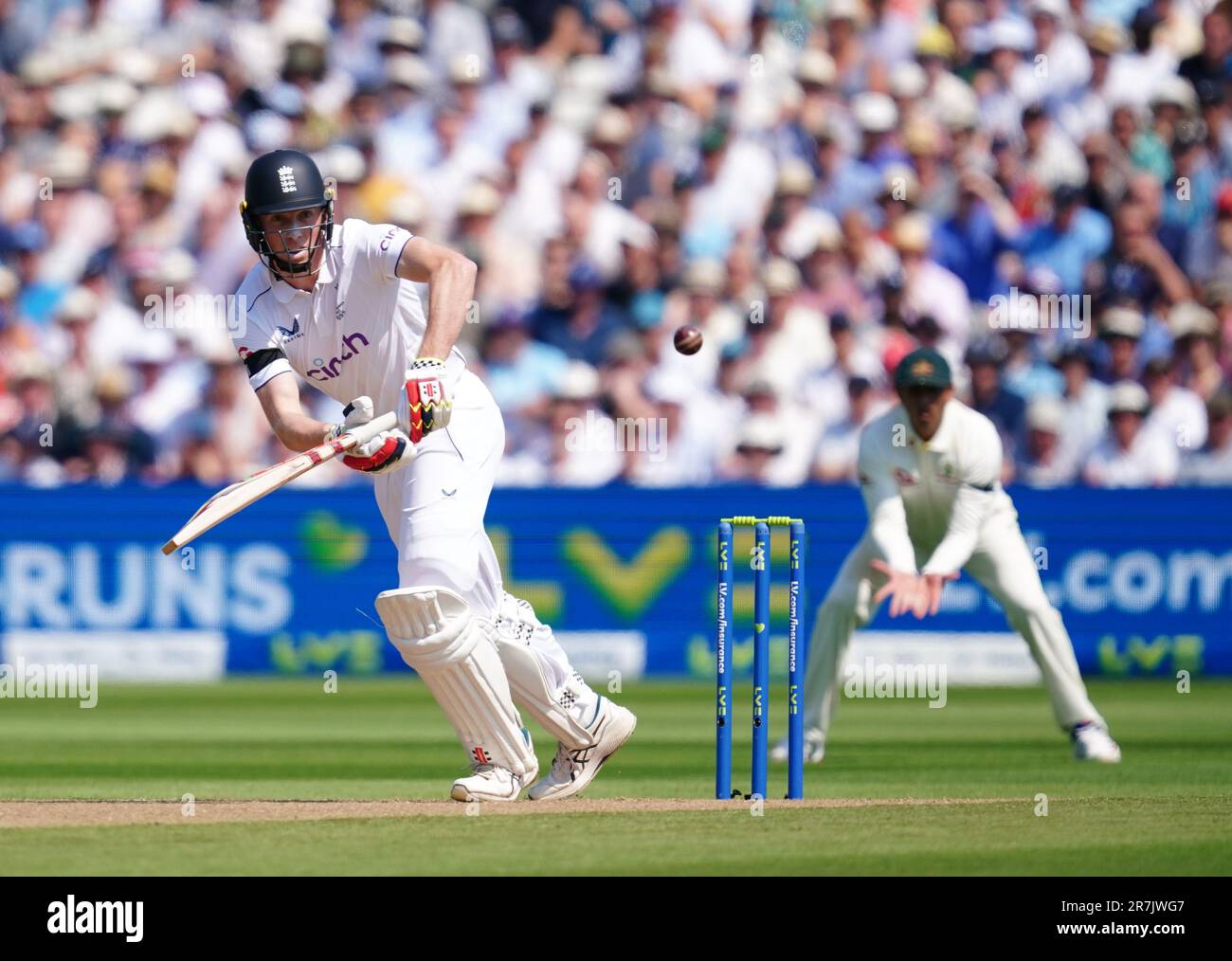 England's Zak Crawley (left) batting on day one of the first Ashes test ...