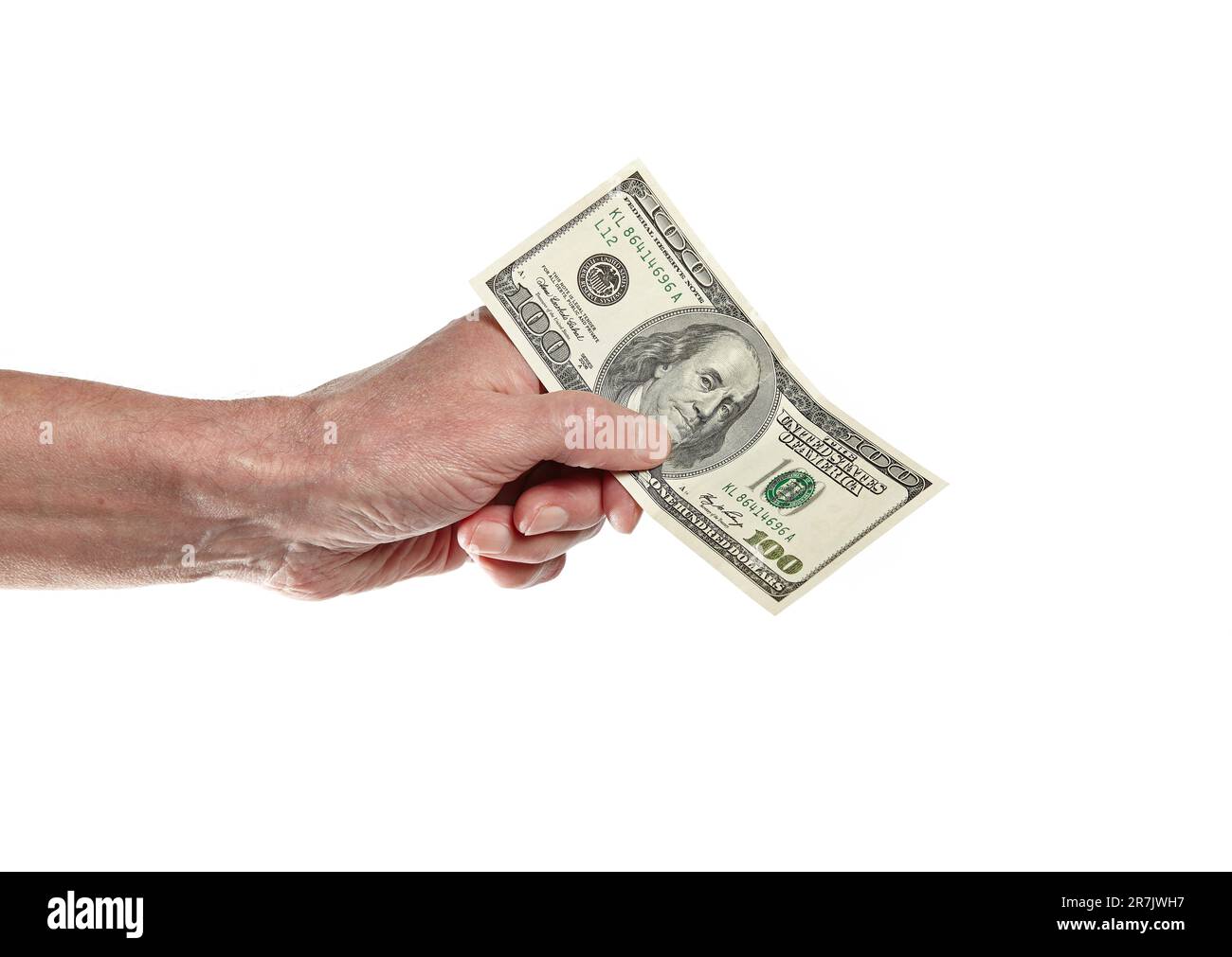 Men's hand holding 100 dollar bill isolated on white background. One ...