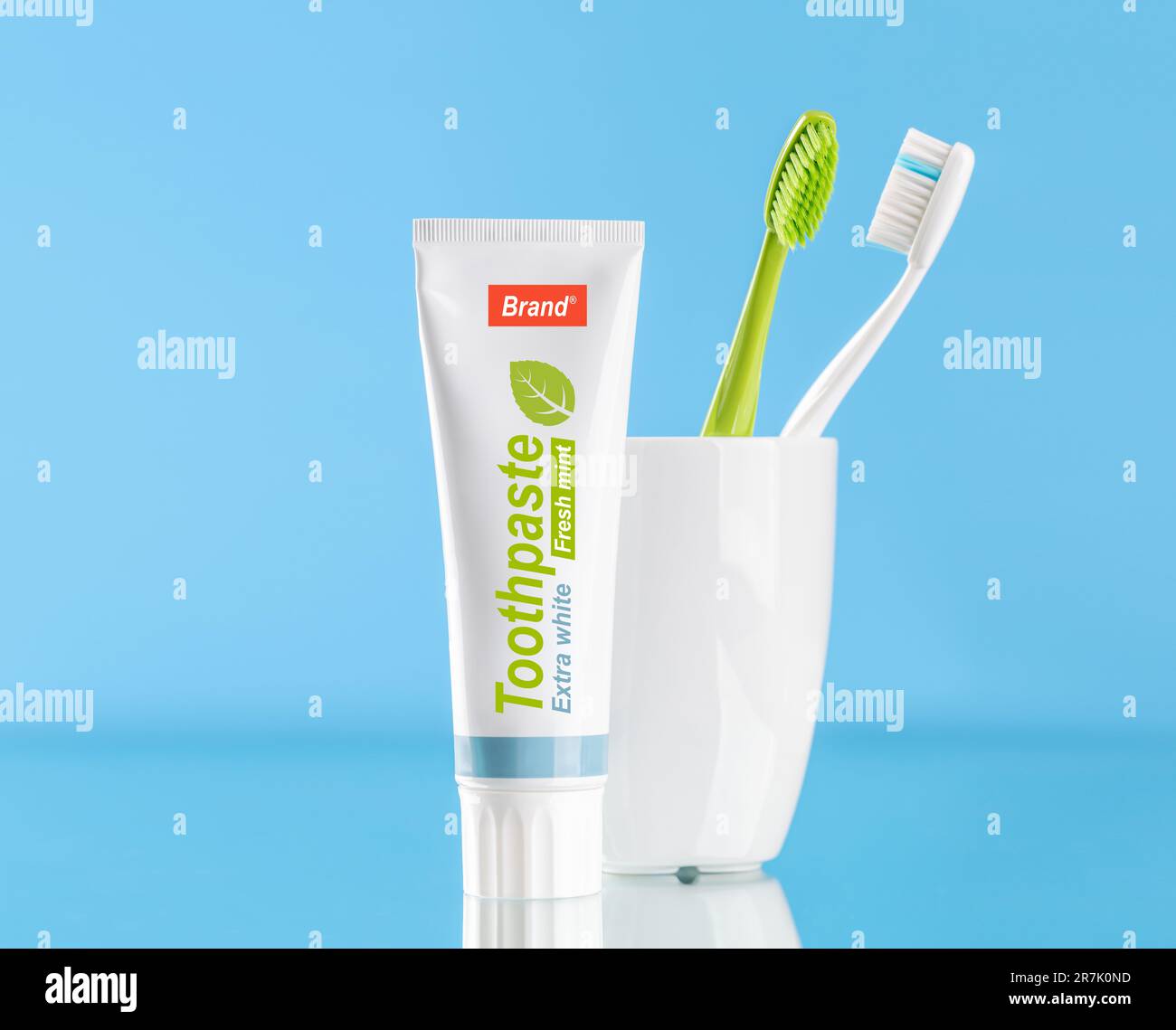A clean and refreshing image featuring toothpaste and toothbrushes ...