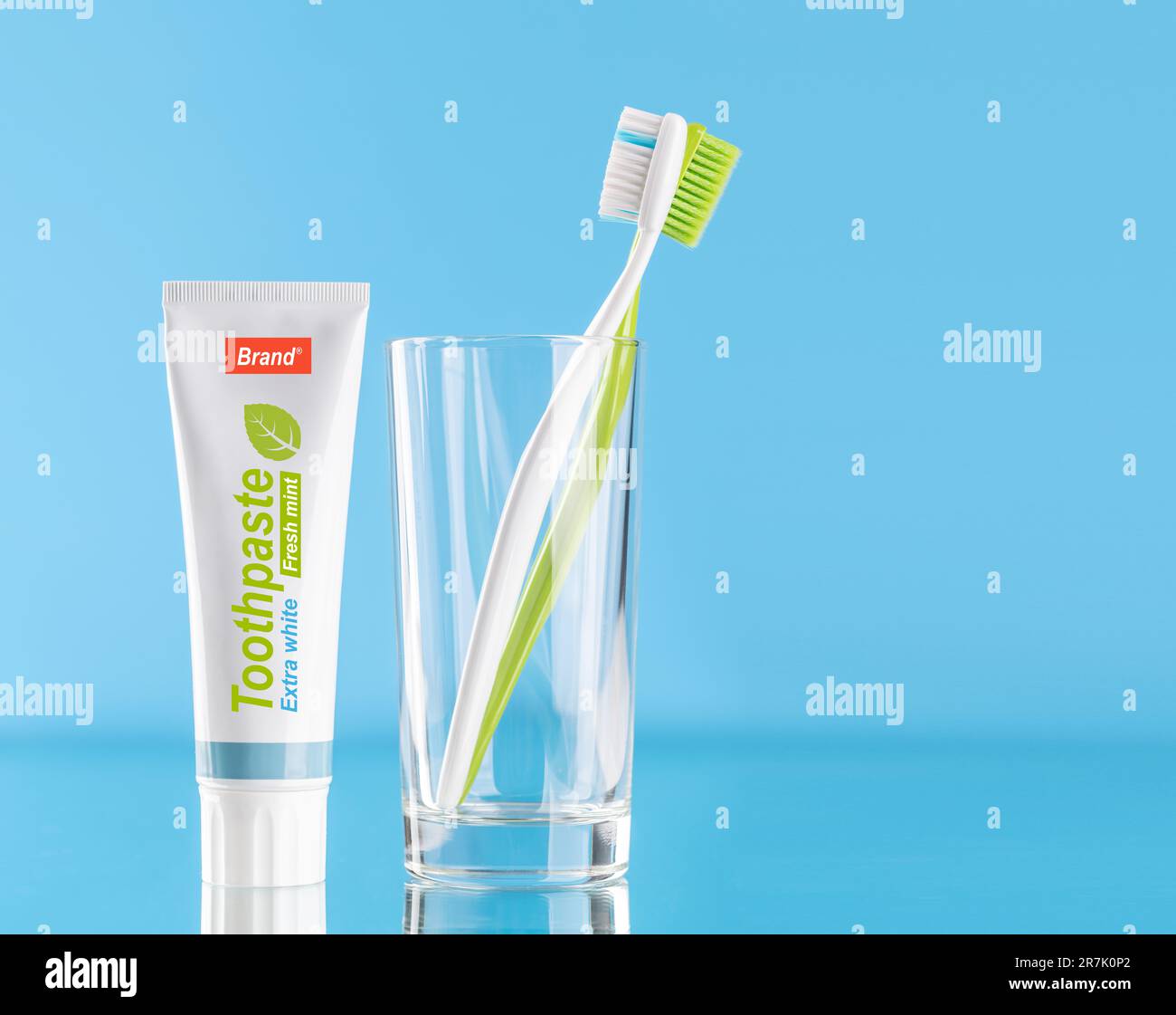 A clean and refreshing image featuring toothpaste and toothbrushes ...