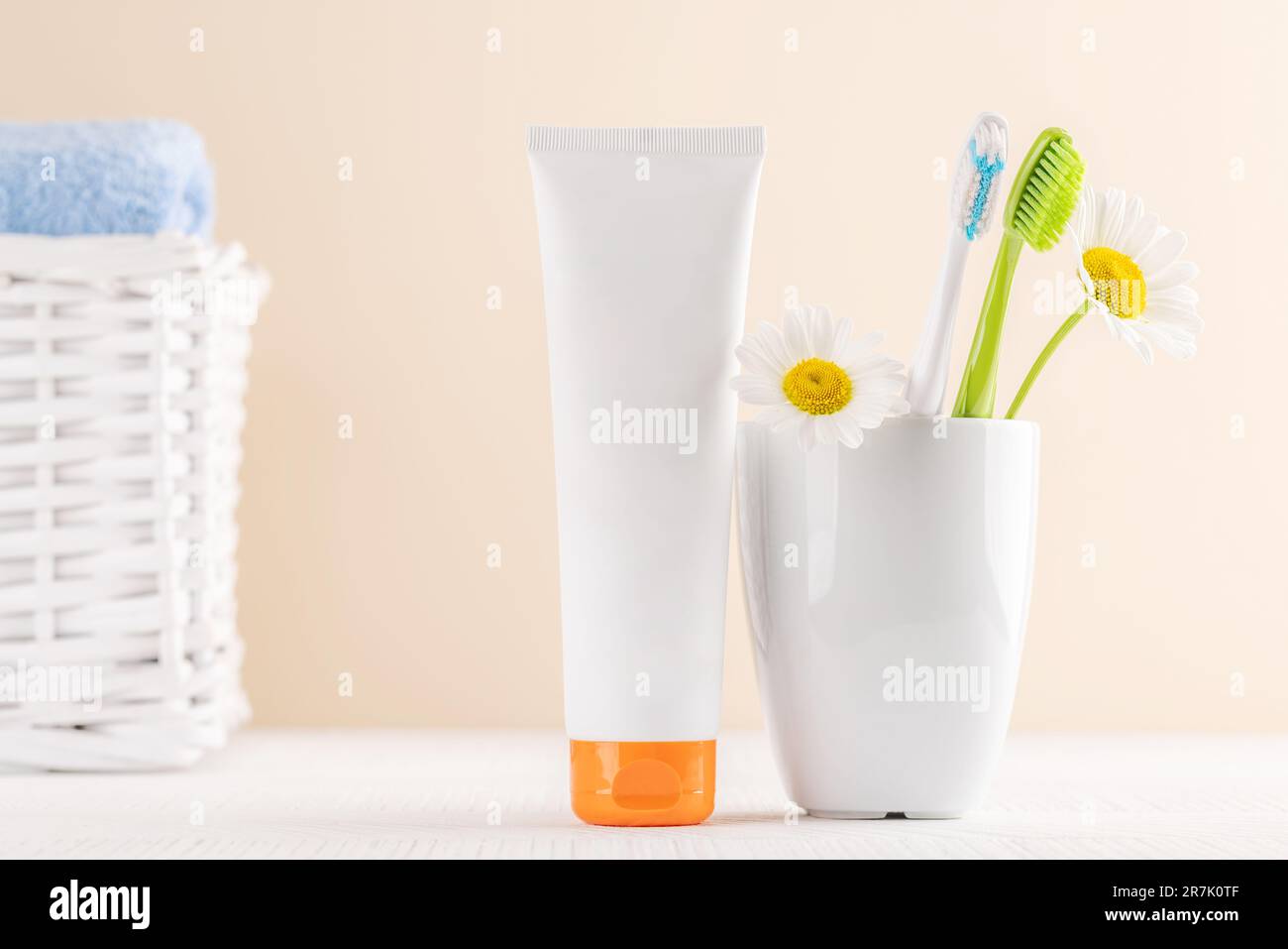 A clean and refreshing image featuring toothpaste and toothbrushes ...