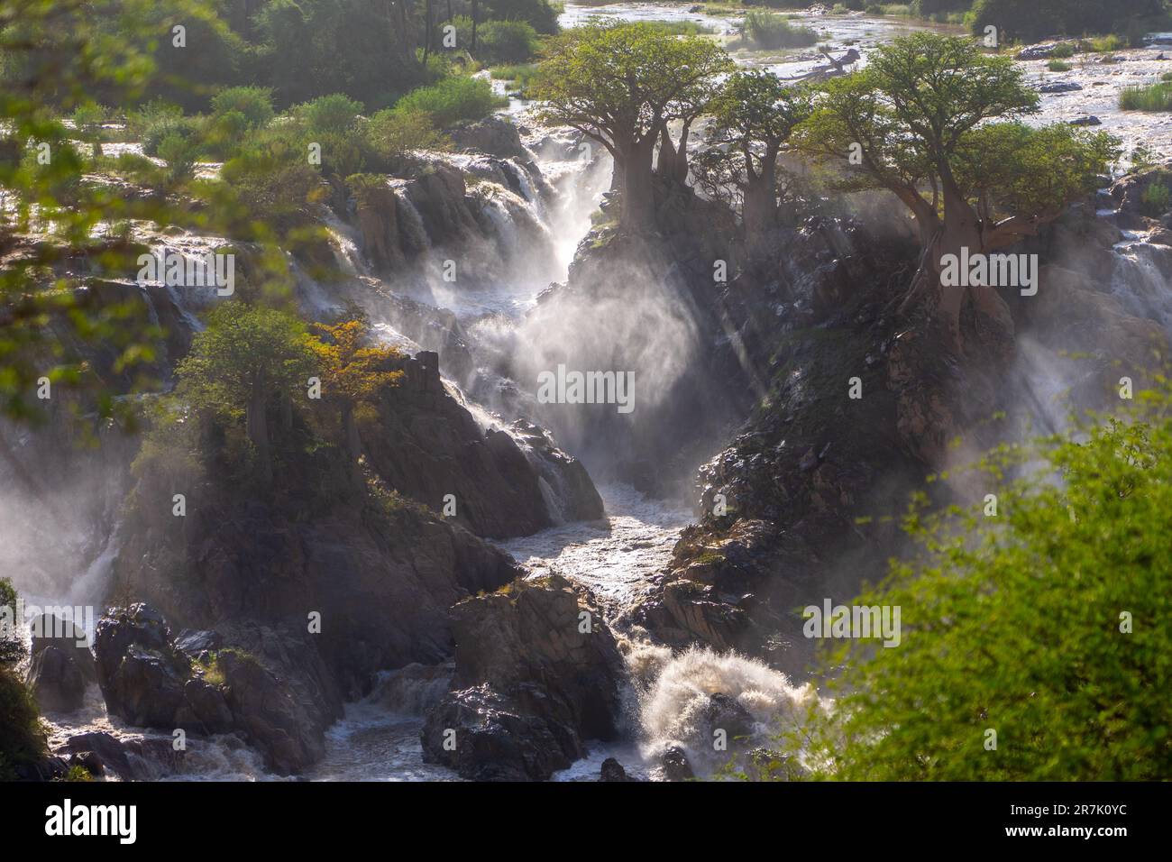 River rushing over jagged cliffs, Epupa falls Cunene River in Namibia ...