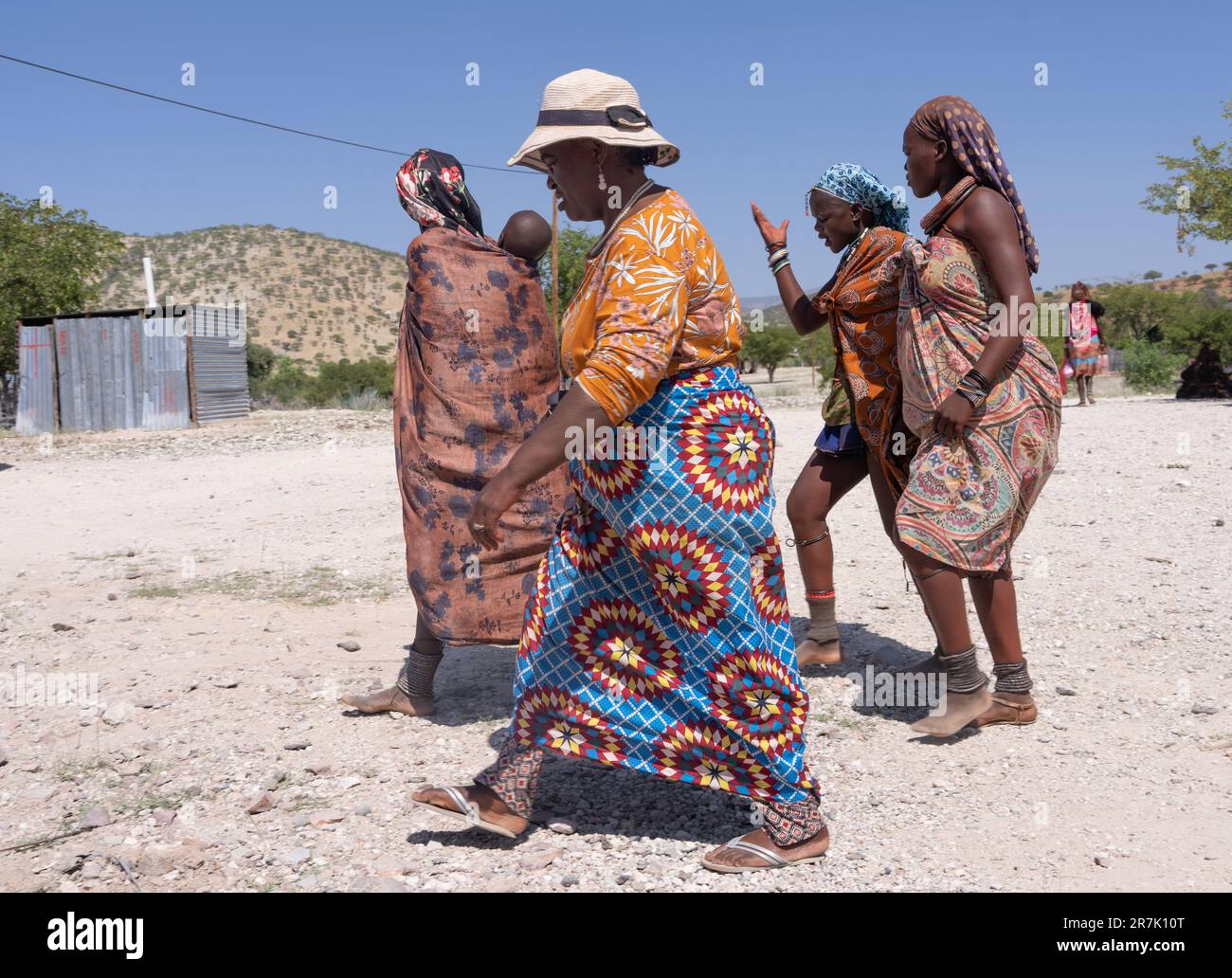 Himba tribeswomen at Epupa falls Cunene River in Namibia on the border ...