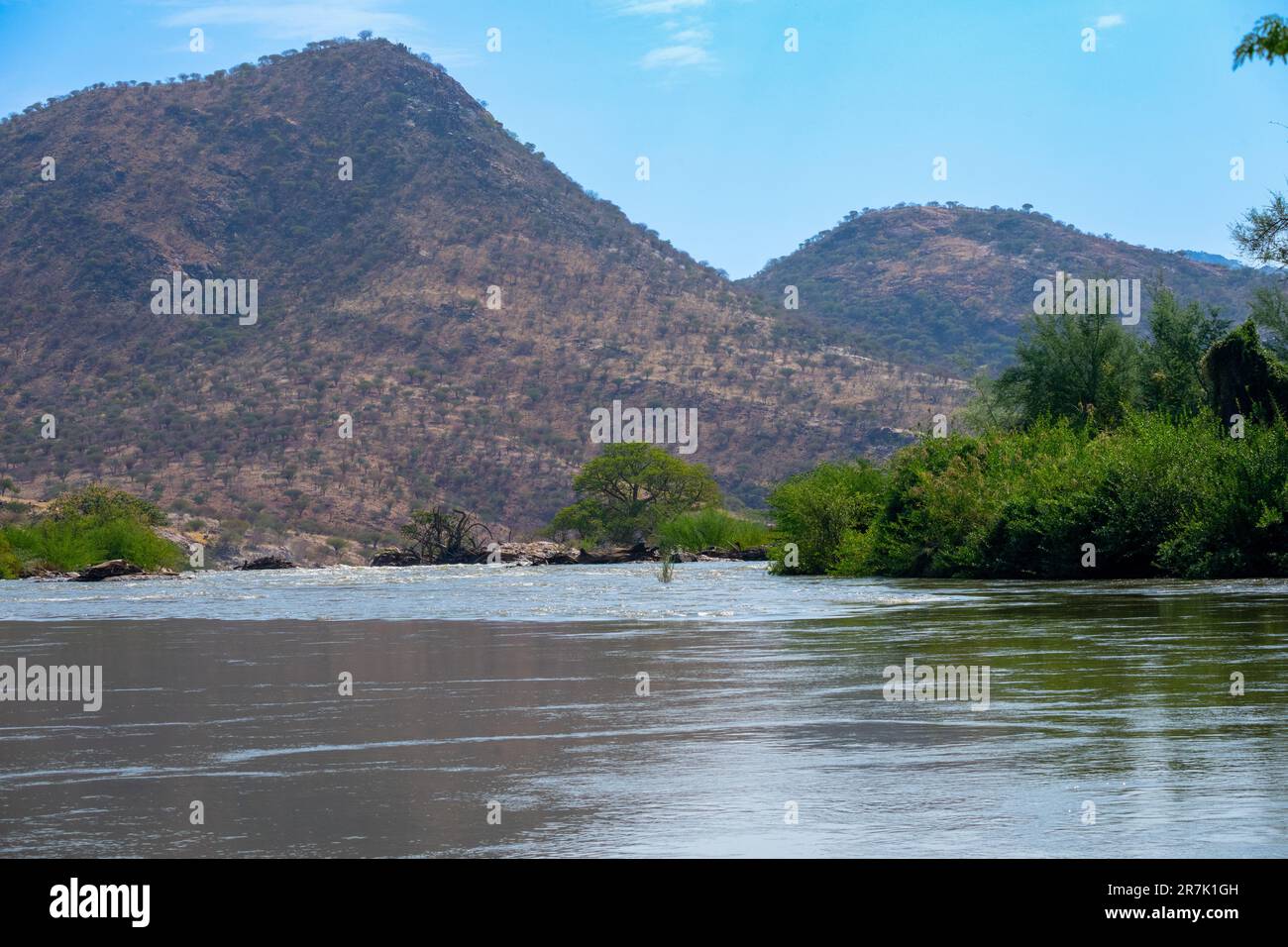 River rushing over jagged cliffs, Epupa falls Cunene River in Namibia ...