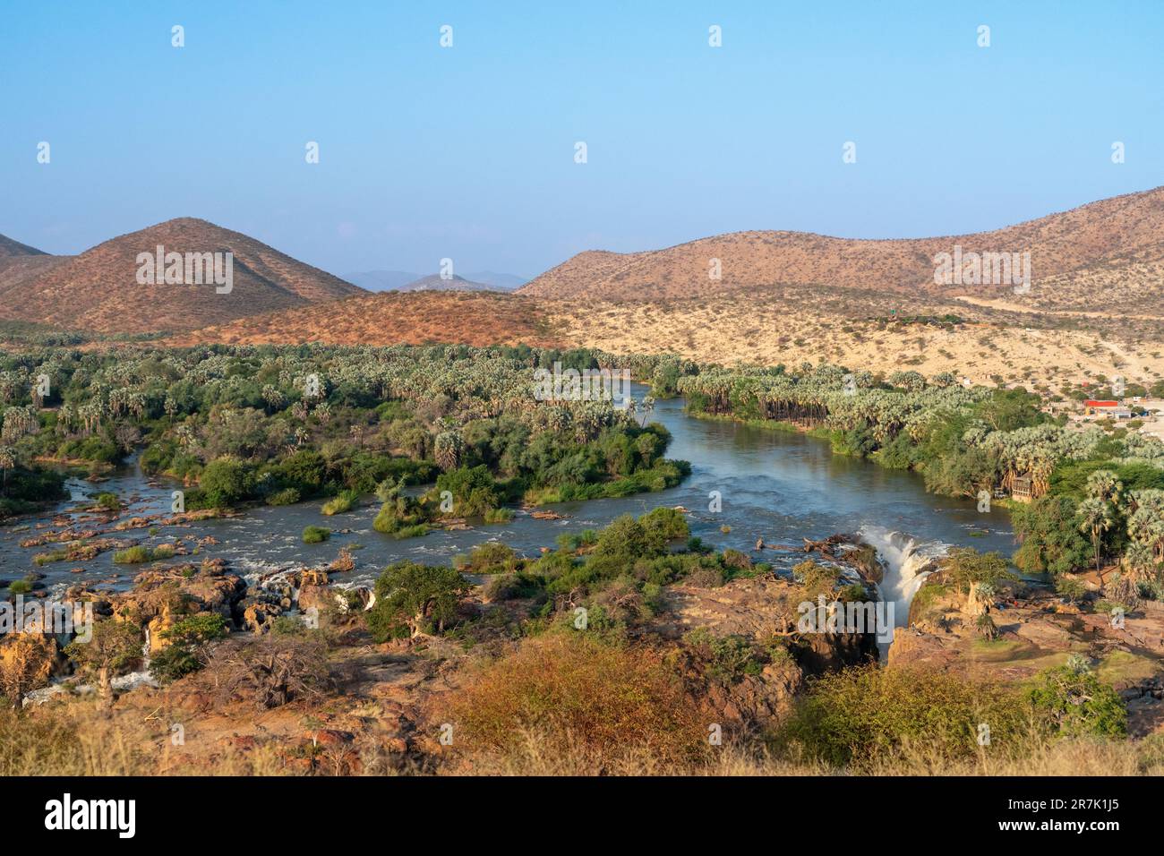 River rushing over jagged cliffs, Epupa falls Cunene River in Namibia ...