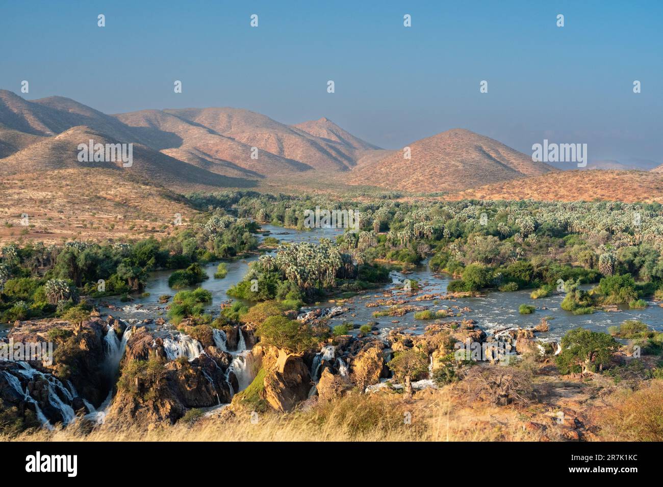 River rushing over jagged cliffs, Epupa falls Cunene River in Namibia ...