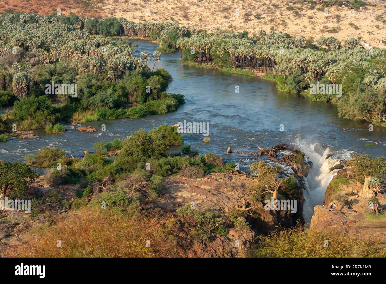 River rushing over jagged cliffs, Epupa falls Cunene River in Namibia ...