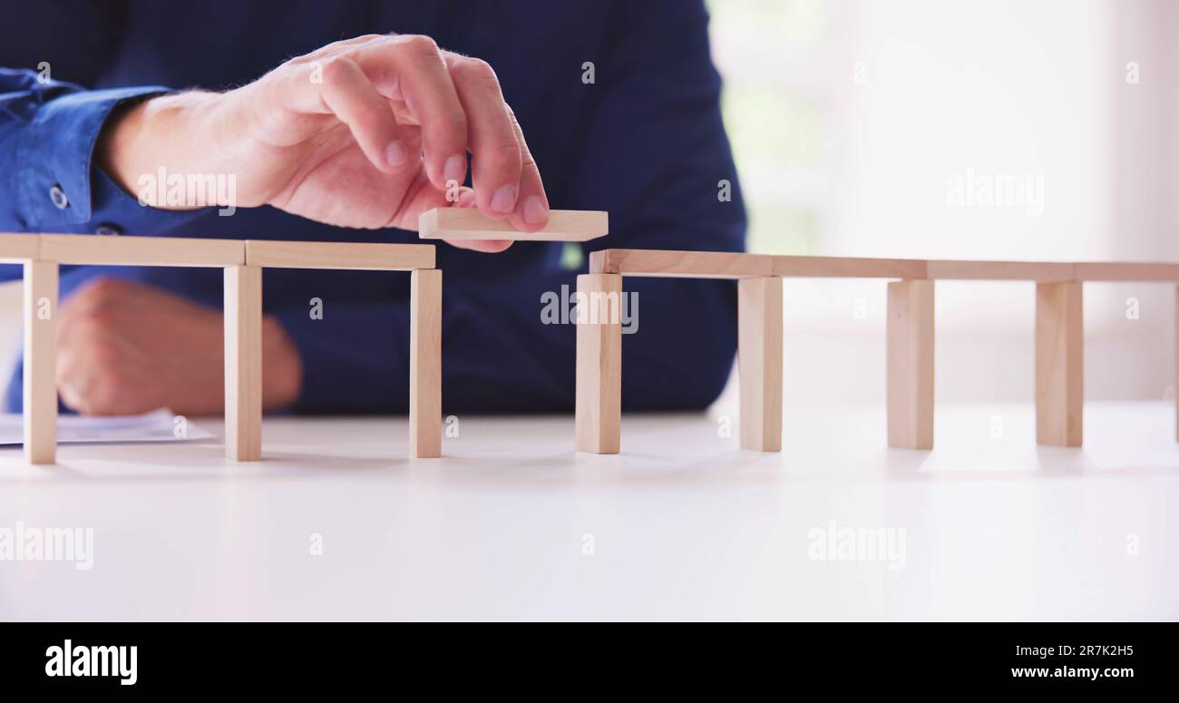Building Bridge Gap With Block. Partnership Concept Stock Photo - Alamy