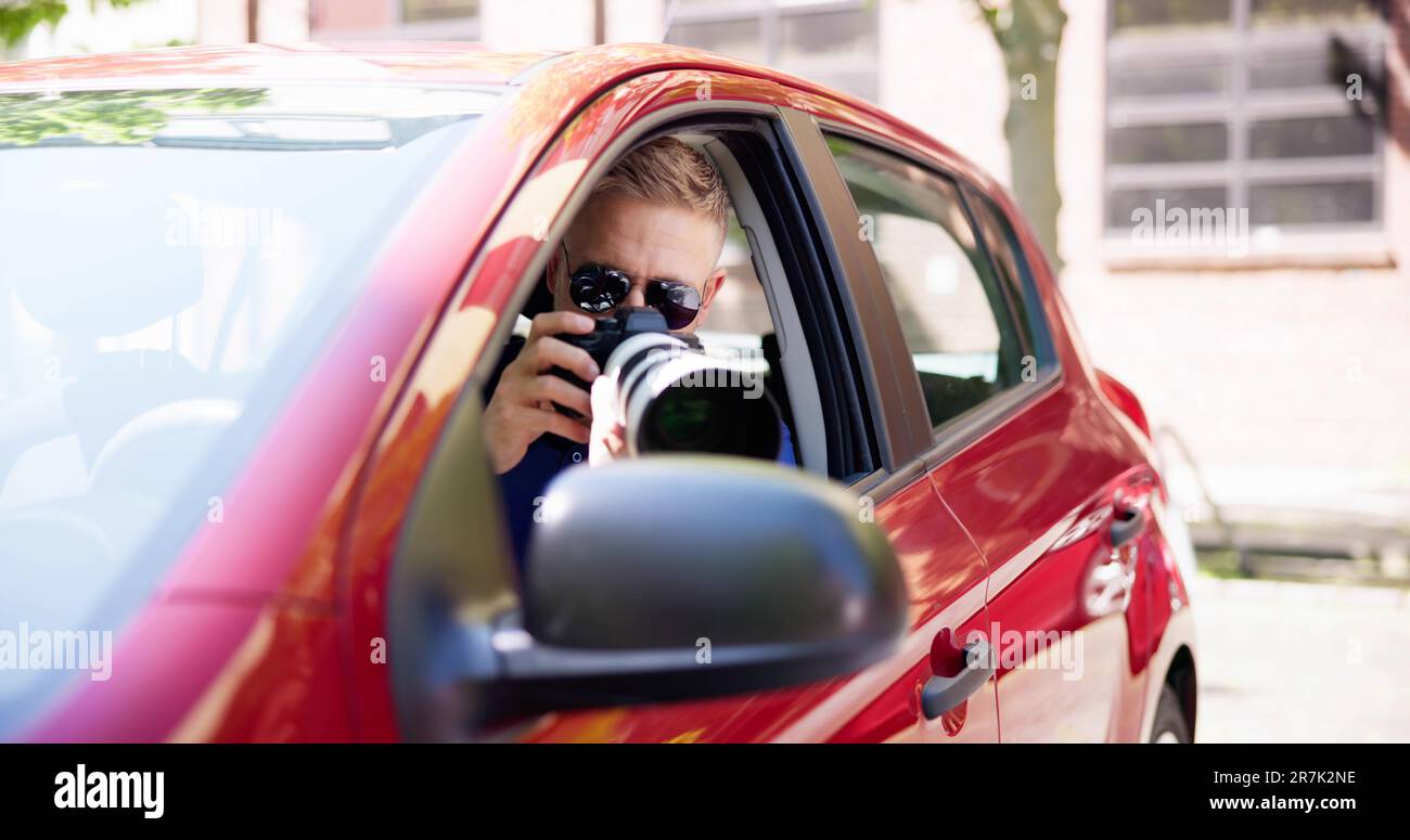 Private investigator in car hi-res stock photography and images - Alamy