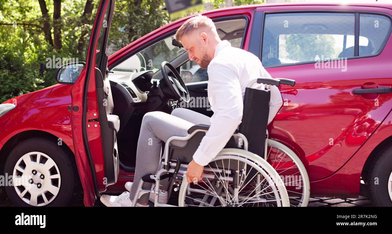 Driver With Disability Getting In Car For Travel Stock Photo - Alamy
