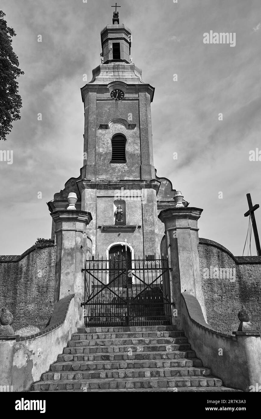 The historic tower of the stone church in the village of Templewo in ...