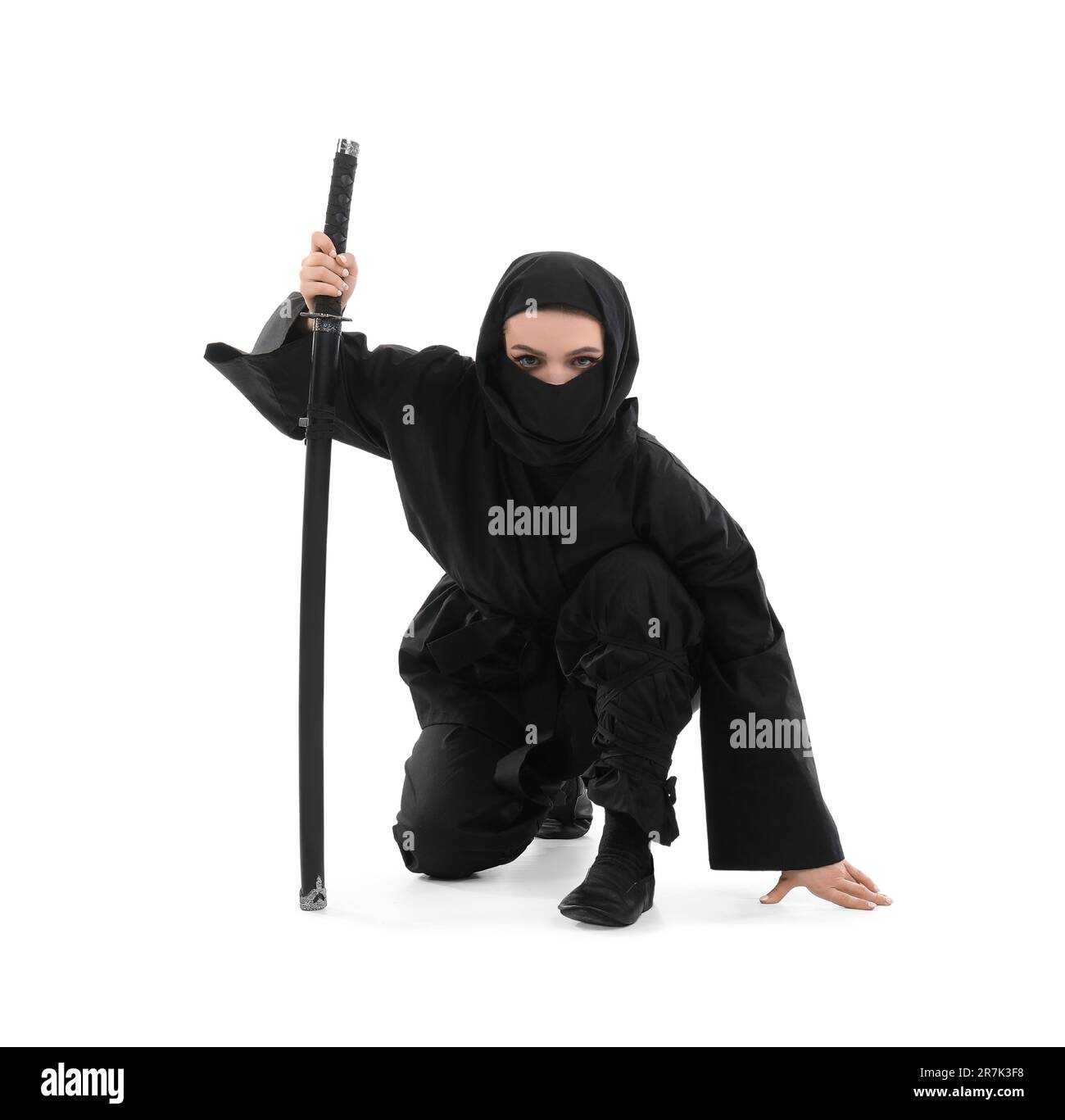 Female ninja with sword isolated on white Stock Photo - Alamy