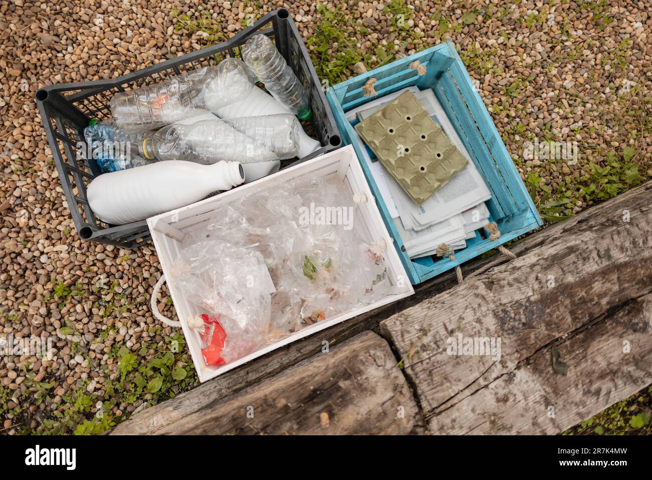 Overhead view of crates with separated waste Stock Photo - Alamy