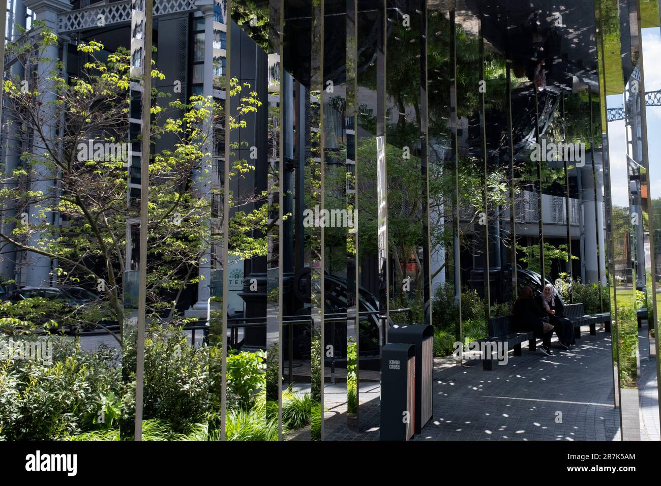 Gasholder park with its refelctive mirror walkway within one of the ...