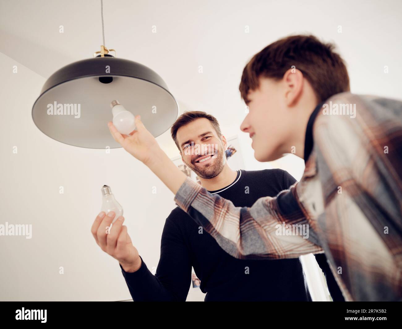 Changing lightbulb hi-res stock photography and images - Alamy