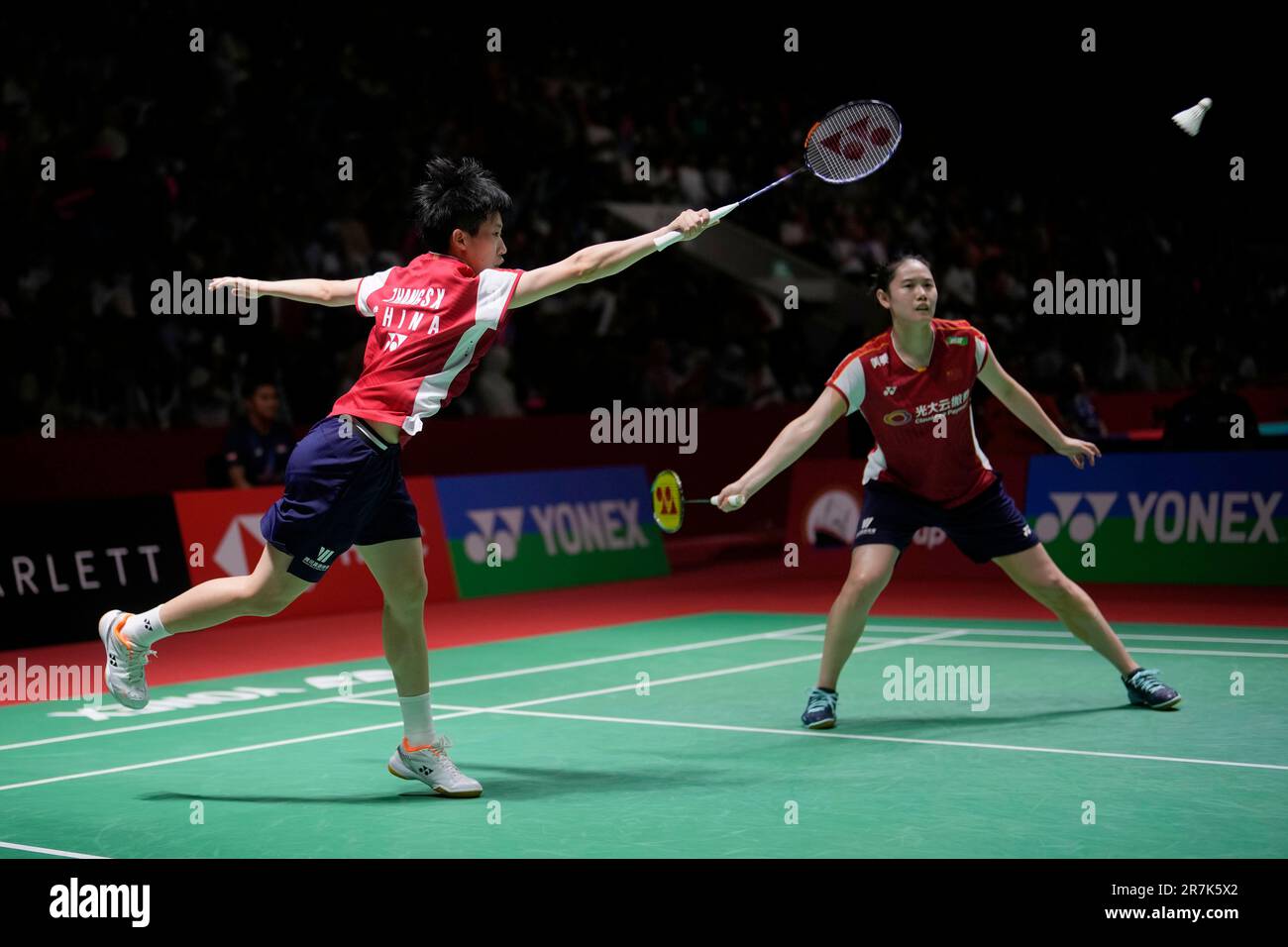 China's Zhang Shu Xian, left, and Zheng Yu play against South Korea's Jeong Na-eun and Kim Hye ...
