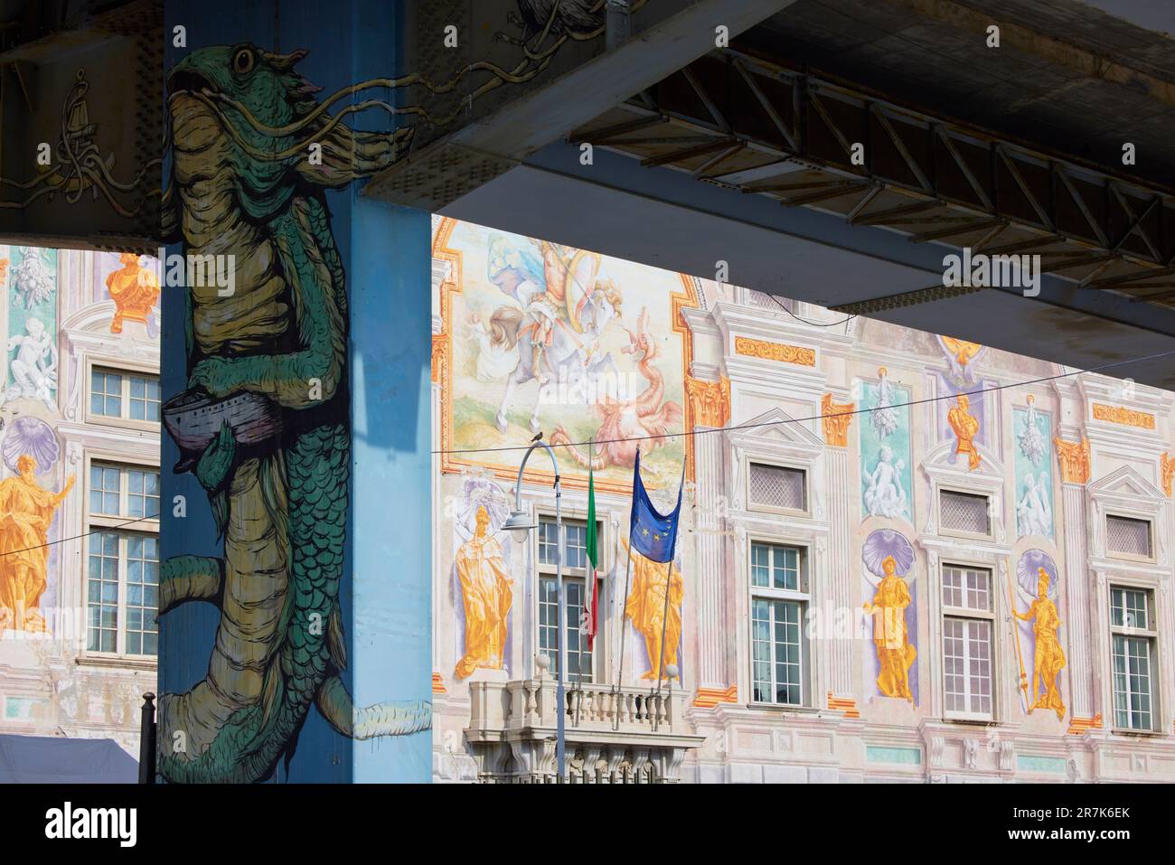 Graffiti on flyover support in front of decorative facade of Palazzo ...