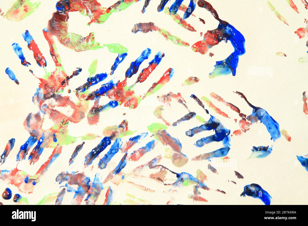 color hand prints as abstract color background Stock Photo - Alamy