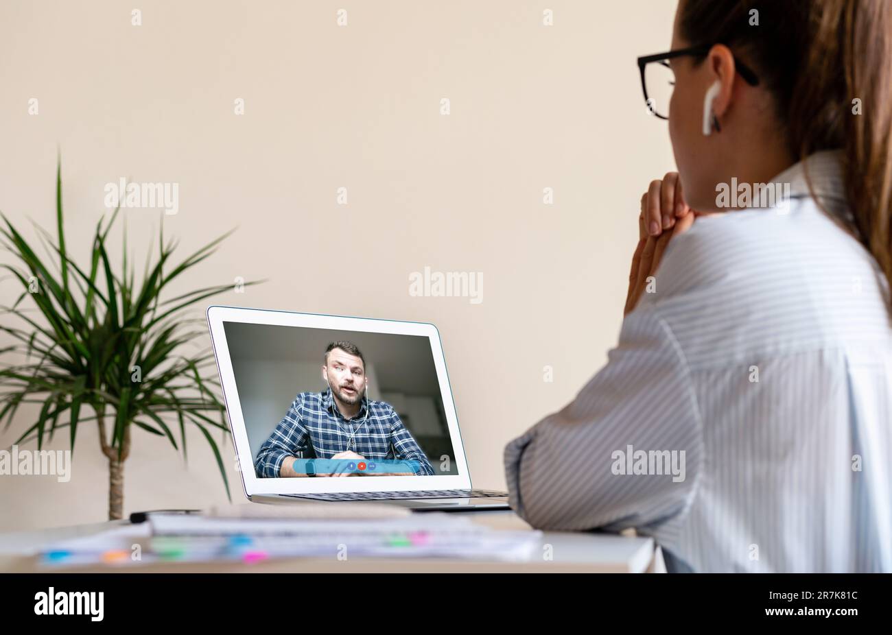 Two people colleagues man and woman have video call. Web conference ...