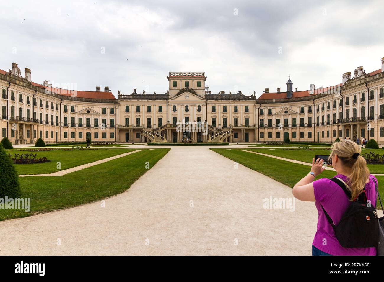 Woman photographing Esterhazy Palace Castle built in late 18th century, Fertod, Hungary Stock ...