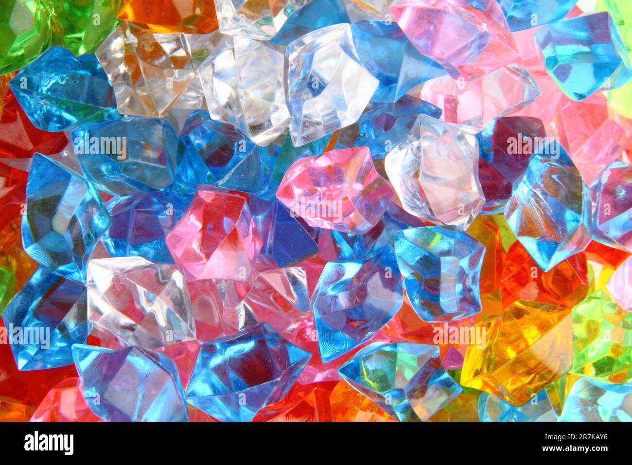 color plastic gems as nice luxury background Stock Photo - Alamy