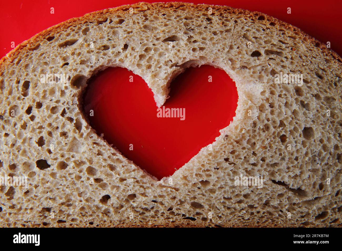 valentine heart in the slice of bread Stock Photo - Alamy
