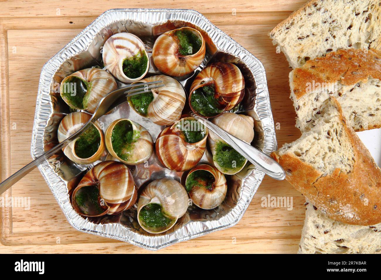 snails (french gourmet food) as nice background Stock Photo - Alamy