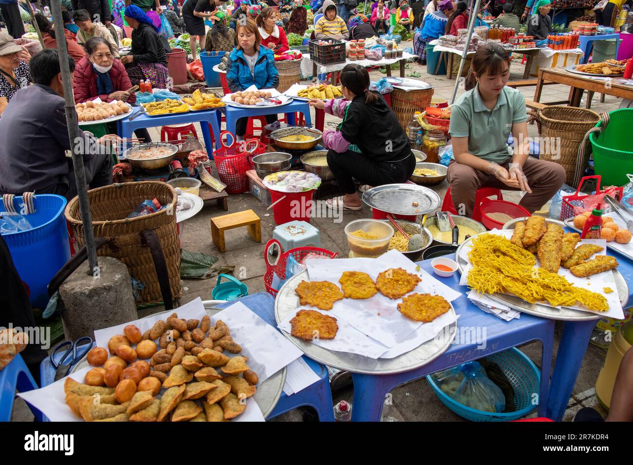 Bac Ha, Vietnam-April 2023; View of women selling just fried food on ...