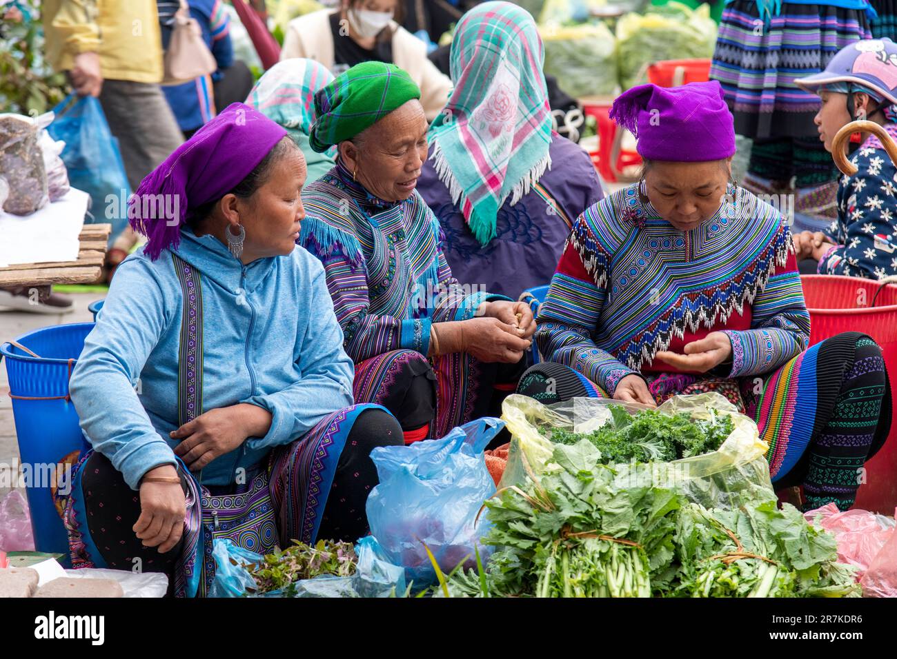 Bac Ha, Vietnam-April 2023; Close up view three women from Flower Hmong ...