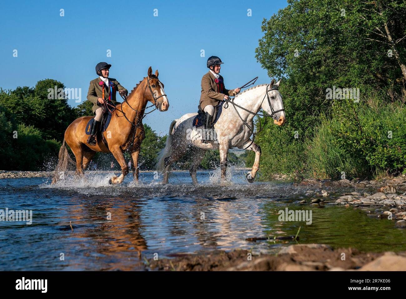 Riders ford the River Ettrick during the Selkirk Common Riding, a ...
