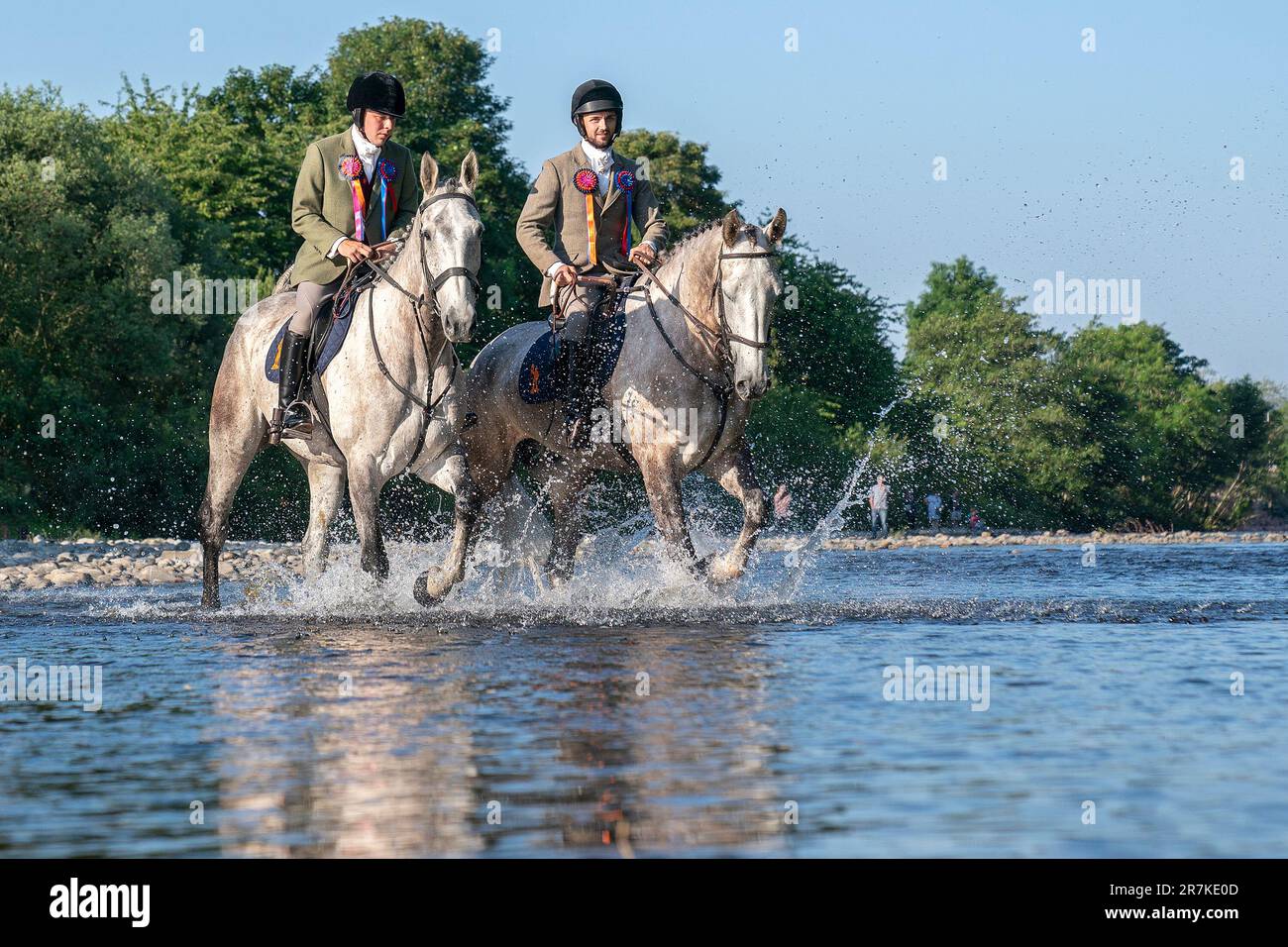 Riders ford the River Ettrick during the Selkirk Common Riding, a ...
