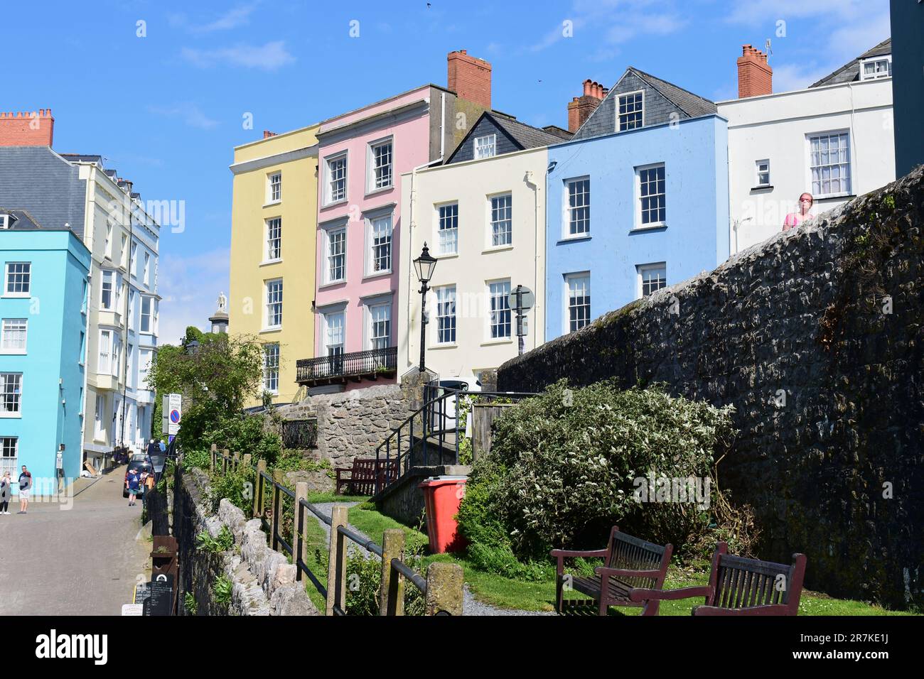 The view looking up Penniless Cove Hill towards the colourful old ...
