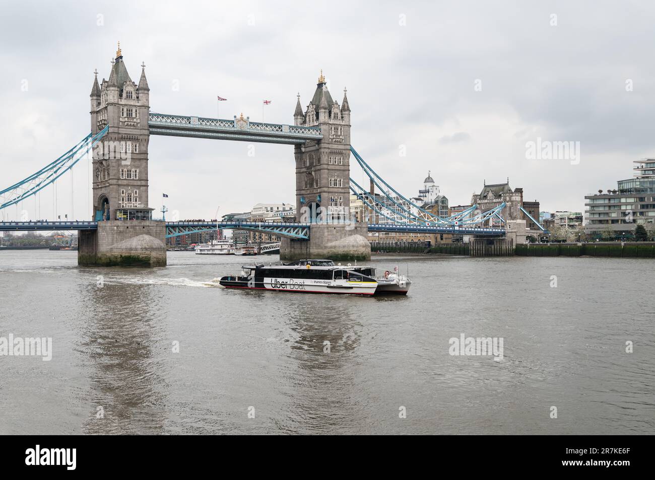 Uber Sponsored Thames Clipper boat in front of Tower Bridge in East ...