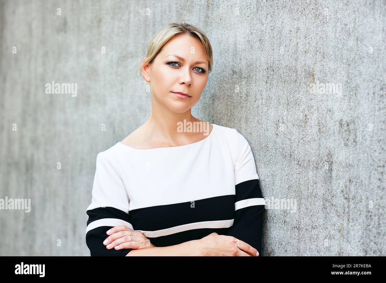 Female model leaning on wall hi-res stock photography and images - Alamy