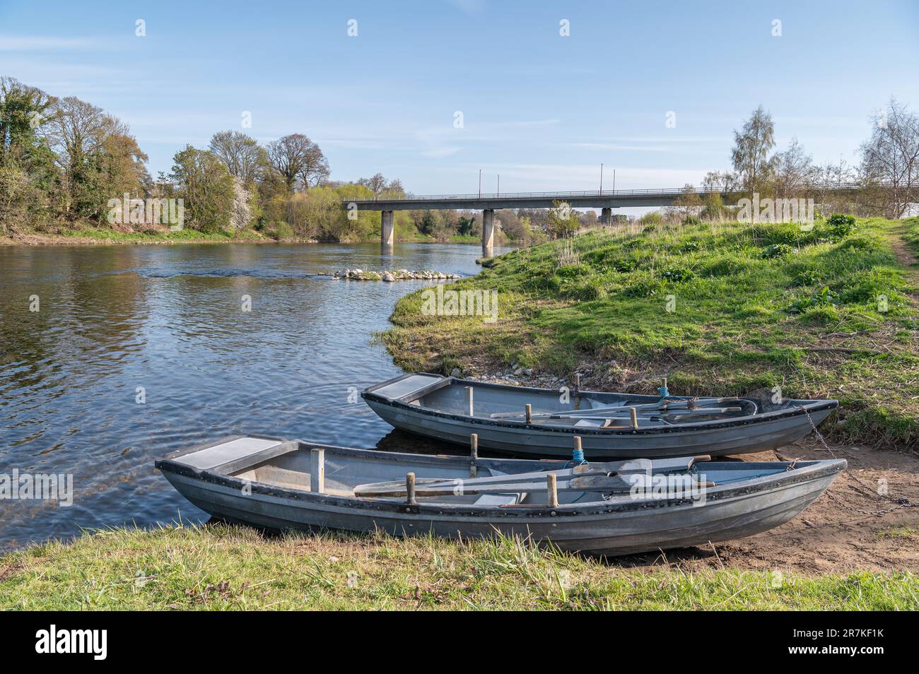 Fishing Boats beached by the River Tweed in the Scottish Borders with ...