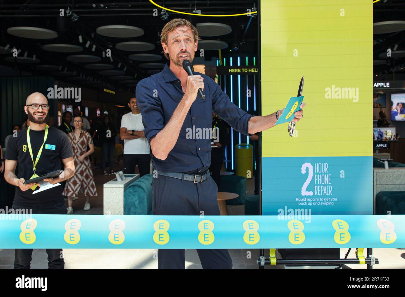 EDITORIAL USE ONLY Peter Crouch attends the opening of the new EE ...