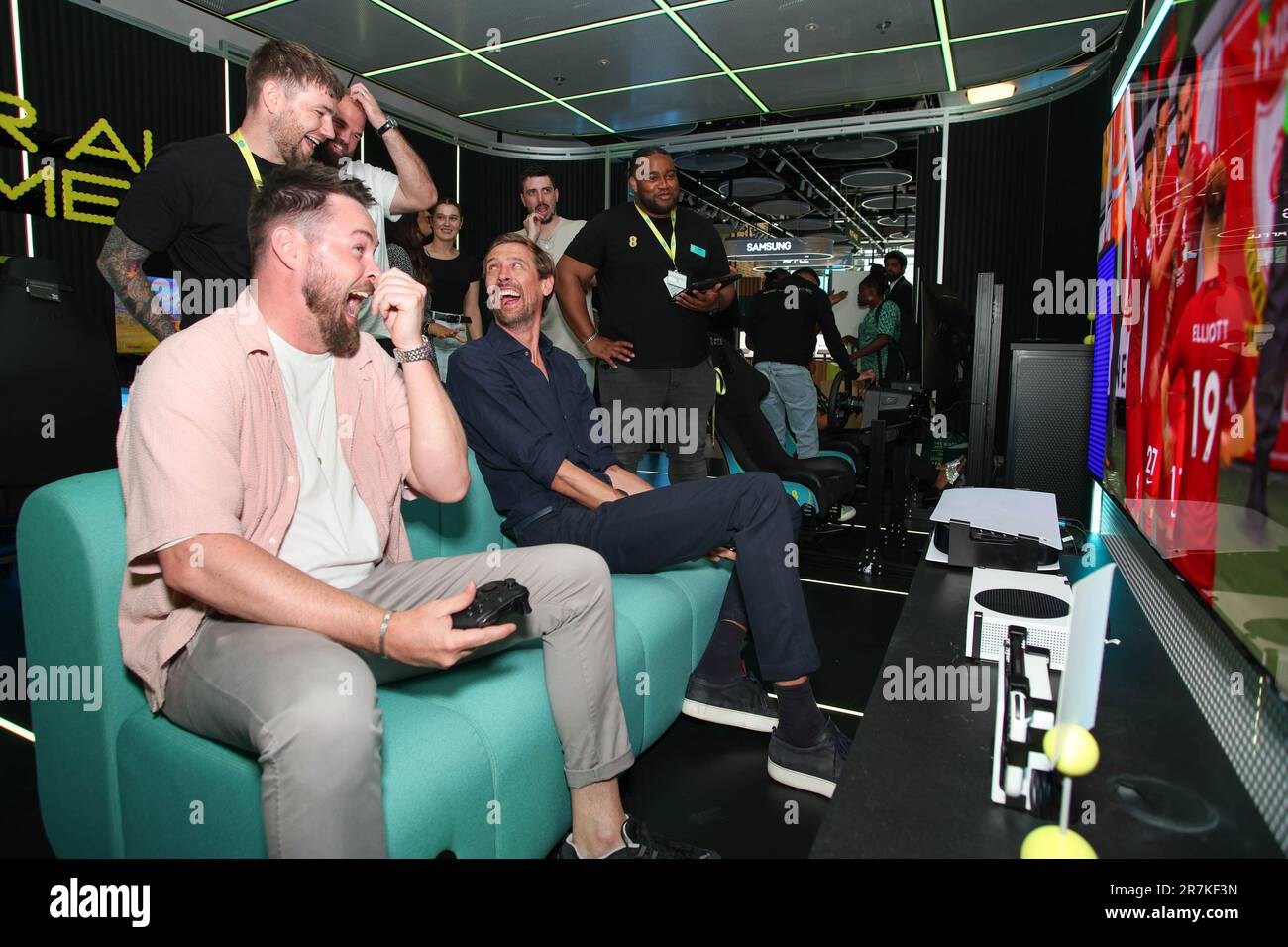 EDITORIAL USE ONLY Peter Crouch (4th from left) attends the opening of ...
